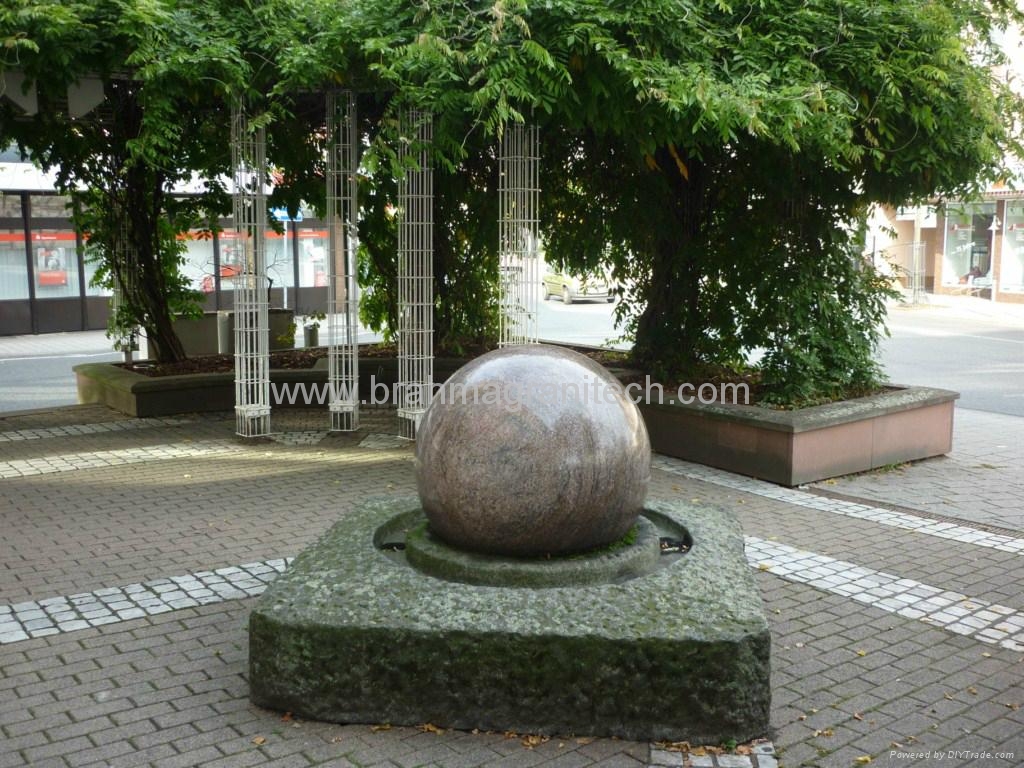 Red ,black,yellow,green,white rotating stone sphere fountains - Red ...